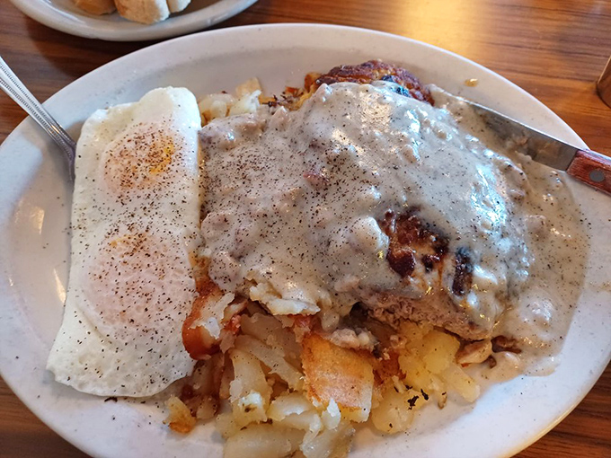Chicken fried steak with gravy so good you'll want to write it love letters. The perfect marriage of crispy and creamy.