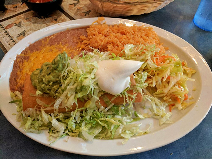 The chimichanga: where deep-fried meets dignity. This golden-brown beauty proves that sometimes the best things in life are wrapped in a tortilla.
