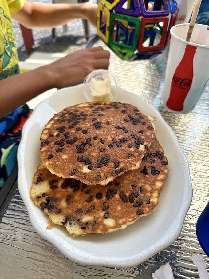 Chocolate chip pancakes that make you question why adults ever stopped ordering from the kids' menu. Childhood joy, supersized.
