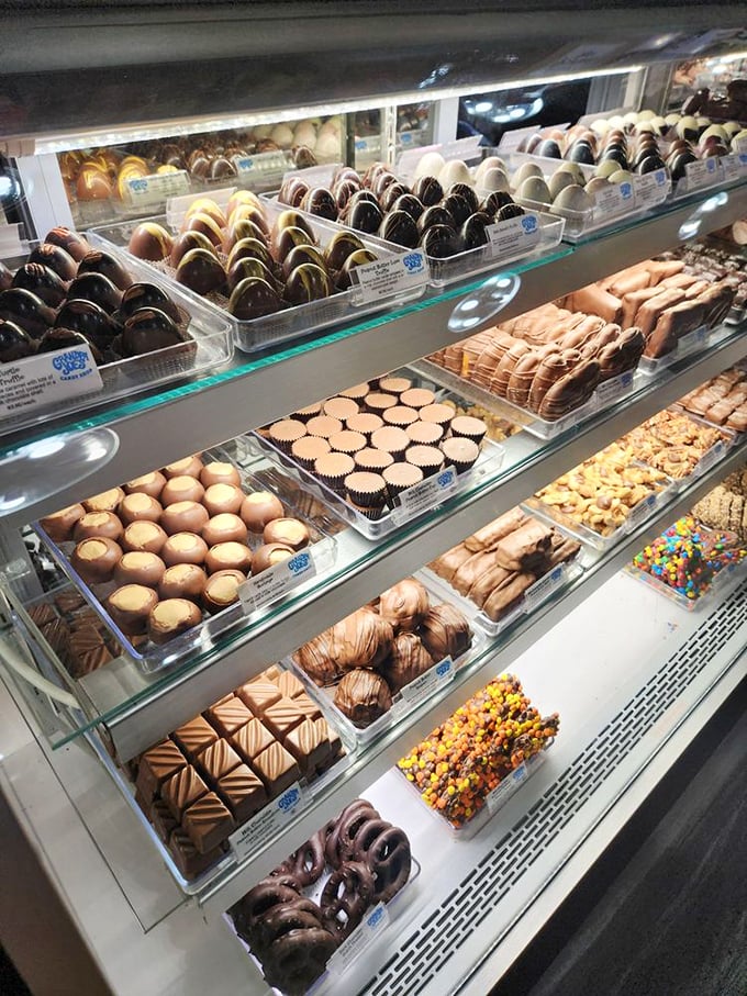 Chocolate display case that would make Willy Wonka file a jealousy complaint. Heaven has display cases, and they look exactly like this.