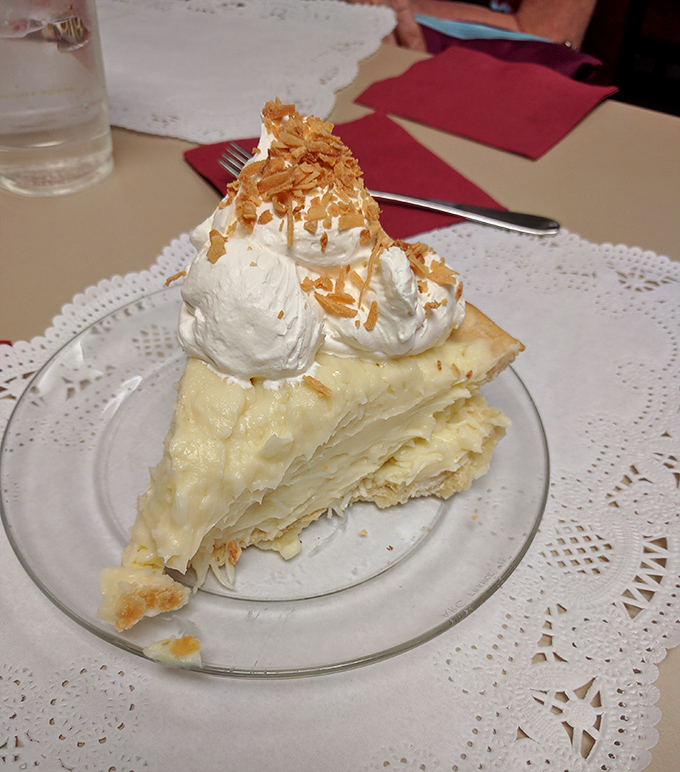 Coconut cream pie so light it practically hovers above the plate, topped with toasted coconut flakes that deliver the perfect textural mic drop.