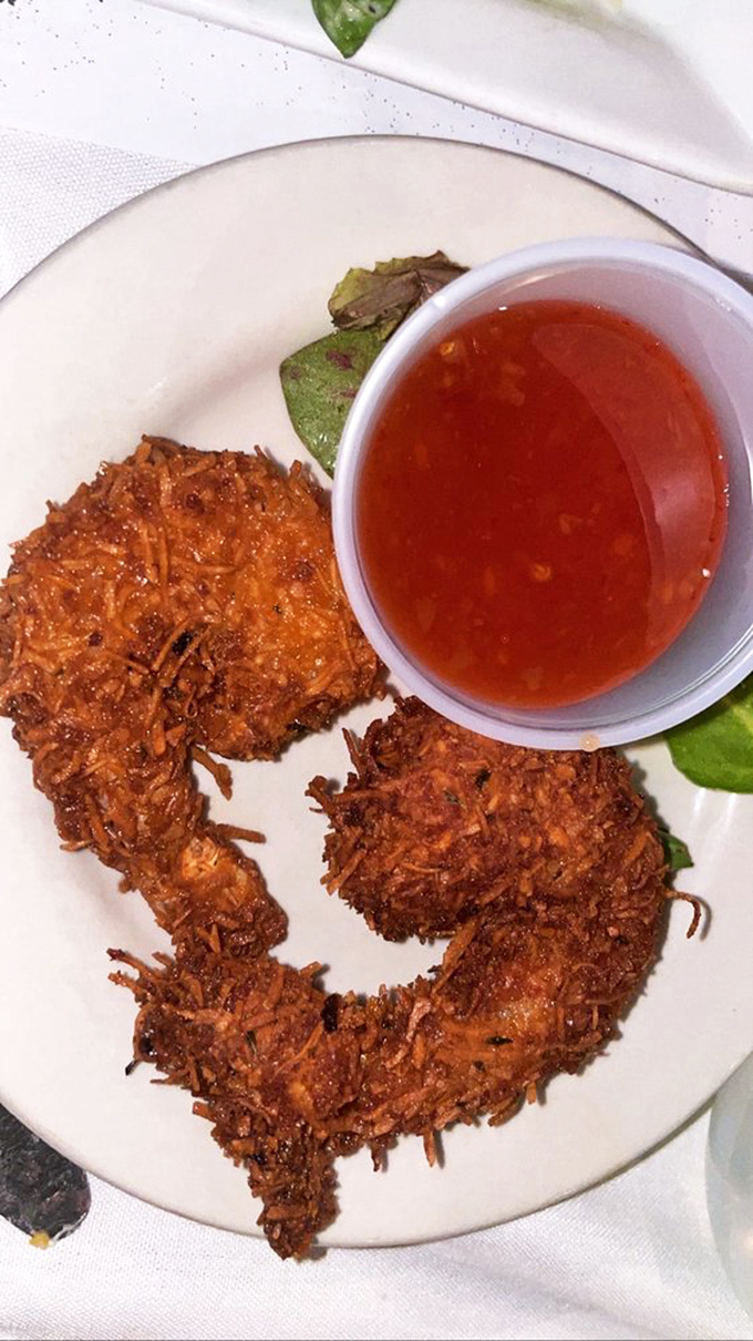 Coconut shrimp that manages to be both crispy and tender, like the culinary equivalent of a firm handshake from an old friend.