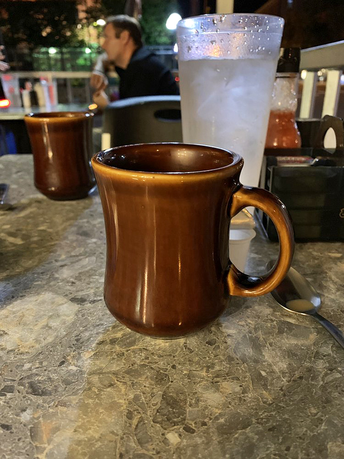 The coffee comes in mugs substantial enough to warm both hands on a Michigan winter morning. Refills are practically mandatory.