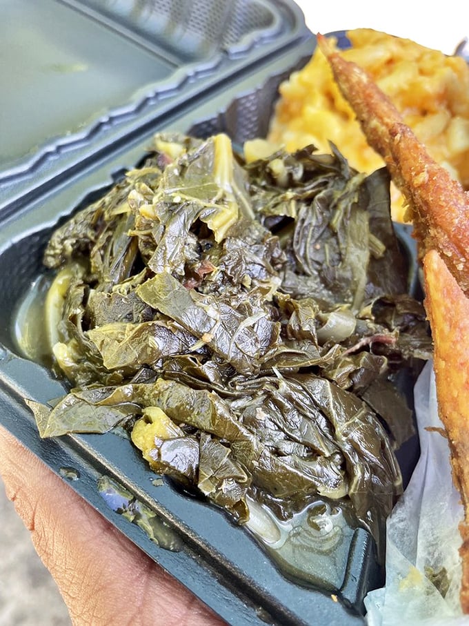 These collard greens have clearly been simmering with purpose, their deep flavor a testament to patience and tradition.