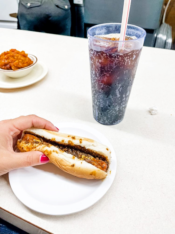 A cold soda alongside your Coney creates that perfect sweet-savory counterpoint that food scientists spend careers trying to replicate.