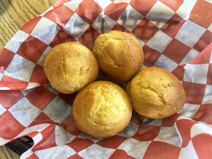 Cornbread muffins so golden they could be currency in a more delicious economy. The perfect sauce-sopping companion to any BBQ feast.