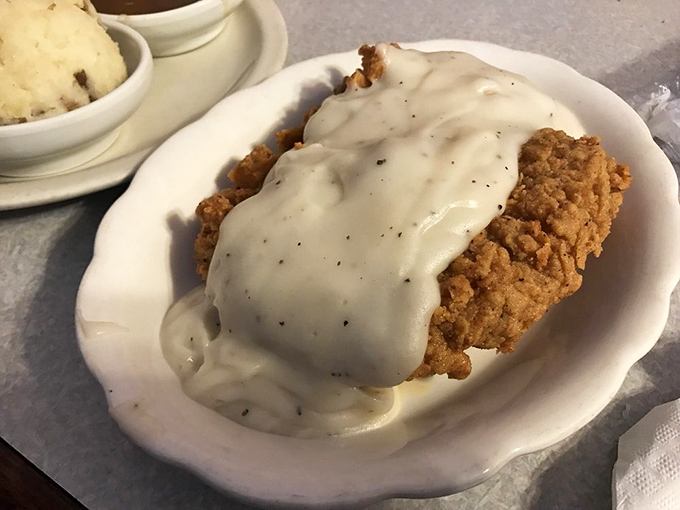 Country fried perfection swimming in gravy so good you'll want to write it love letters. Comfort food that speaks directly to the soul.