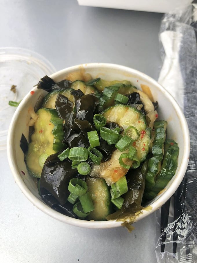 The cucumber poke brings fresh, bright flavors to the table. Seaweed and scallions add complexity that makes this side dish a star in its own right.