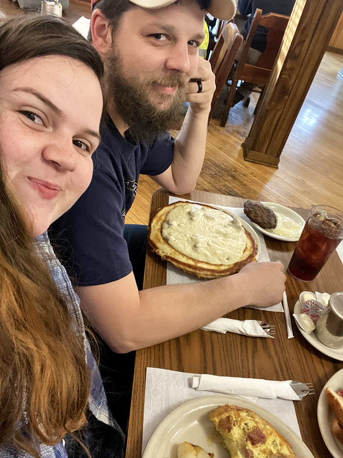 Happy diners enjoying the simple pleasure of good food and better company &ndash; the universal language of a great local restaurant.