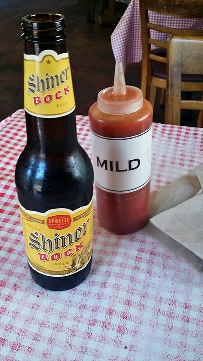 The universal language of barbecue: a cold Shiner Bock and squeeze bottle of sauce labeled "Mild"&mdash;though in New Hampshire, that might still raise a Yankee eyebrow.