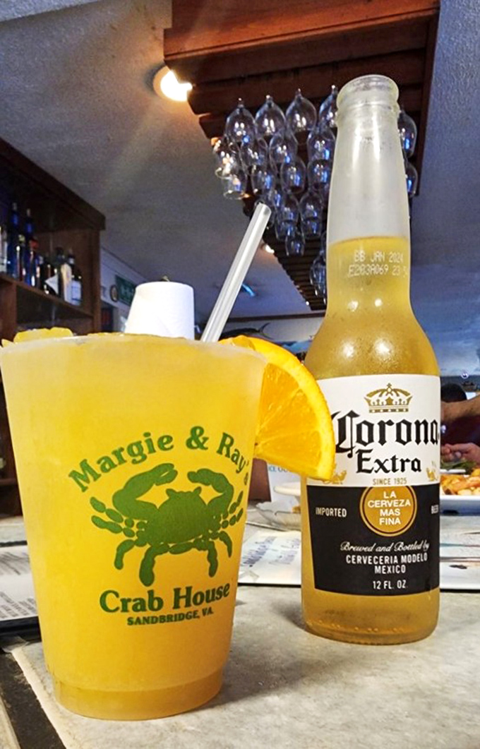 The official summer uniform of Virginia Beach: a cold Corona and a plastic cup that promises crab in your immediate future.