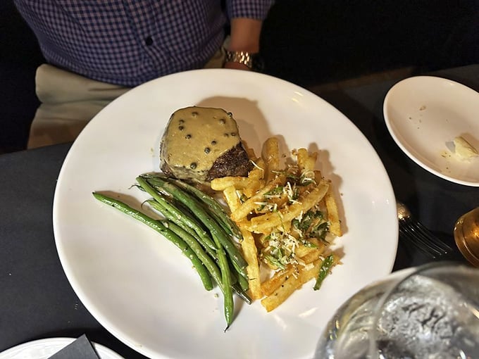 Steak topped with blue cheese and crispy onions&mdash;the culinary equivalent of a perfect jazz trio. Each element plays its part without overshadowing.