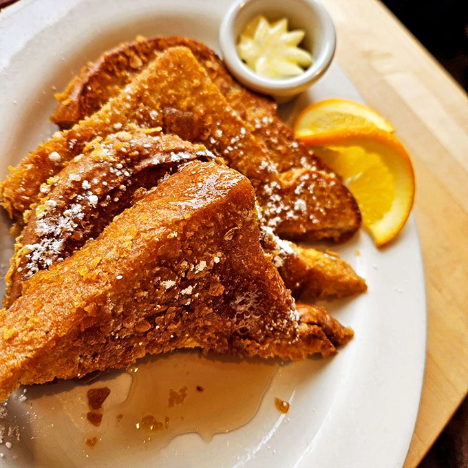 Golden French toast that's crispy outside, custardy inside—the breakfast equivalent of finding front-row concert tickets in your pocket.