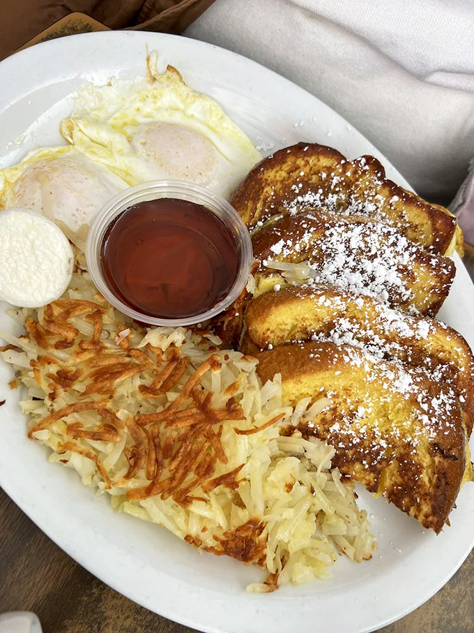 French toast that's had a proper powdered sugar snowfall &ndash; the kind of breakfast that makes you forgive Monday for being Monday.