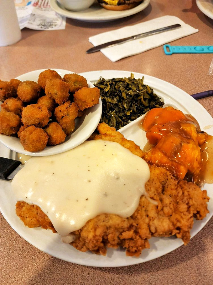 Southern fried chicken with cream gravy &ndash; proof that sometimes the best things in life require both napkins and a post-meal nap.