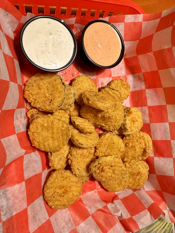 Fried pickles: proof that anything dipped in batter, fried to golden perfection, and served with creamy dipping sauce becomes irresistible.