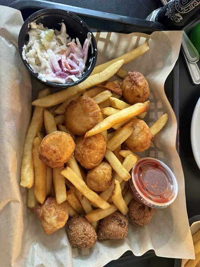 Fried scallops and hushpuppies: the dynamic duo of seafood baskets that makes you wonder why you ever eat anything else.