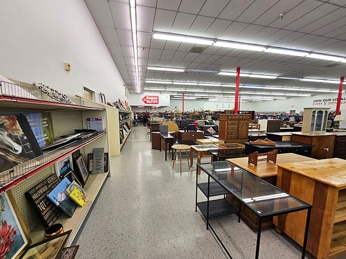 Media cabinets and bookshelves create a wooden forest of storage possibilities. That portable air conditioner suggests even appliances deserve a second chance at love.