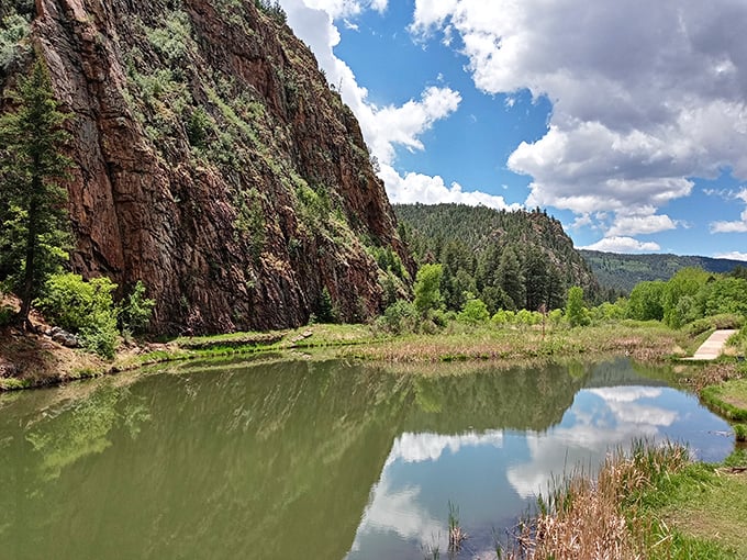 The Gallinas River creates a peaceful oasis with dramatic red rock formations. Mother Nature showing off her best work without charging admission.