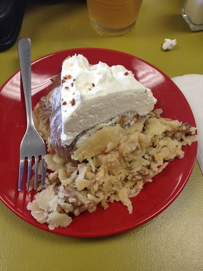 Layers of chocolate decadence crowned with whipped cream and chocolate shavings. Resistance is futile.