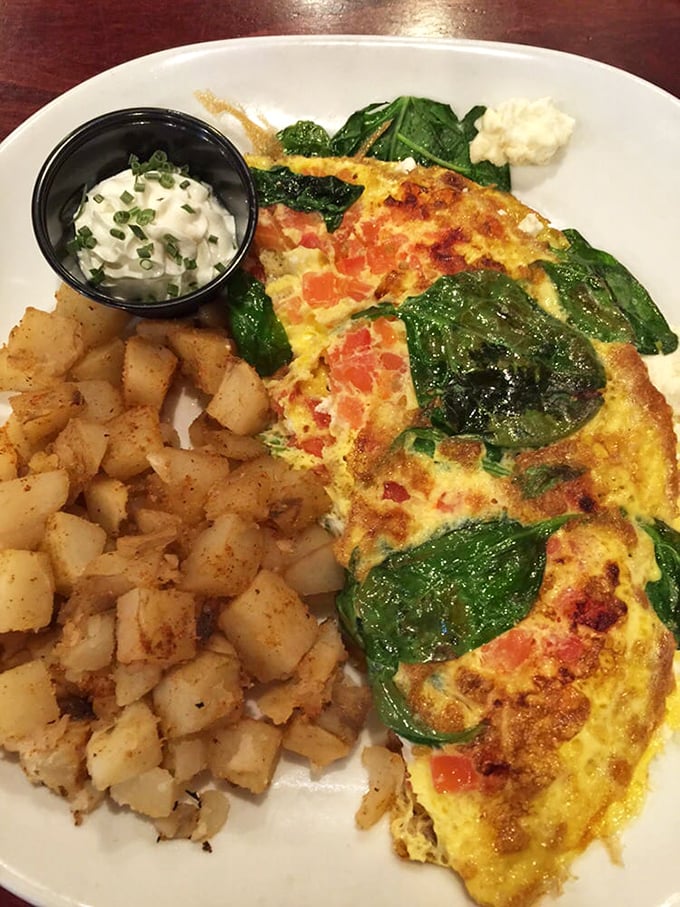 The classic American breakfast done right&mdash;eggs, sausage, toast, and those home fries that somehow achieve the impossible: crispy outside, fluffy inside perfection.