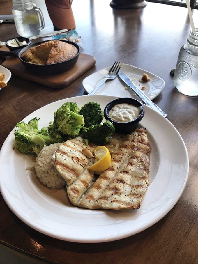 Simple grilled fish elevated to art form &ndash; tender, flaky, and served with vegetables that didn't come from the freezer section. Healthy never tasted so rebellious.