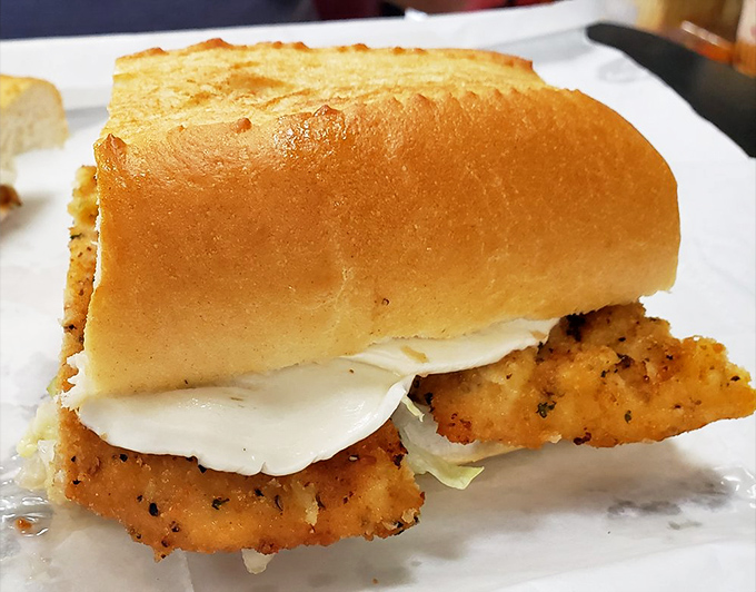 The chicken parmesan sandwich: proof that sometimes the best things in life are indeed breaded, fried, and covered in cheese and sauce.