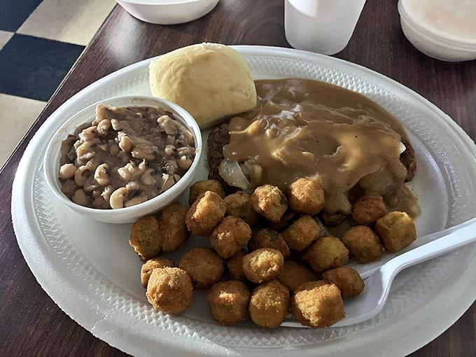 Hamburger steak swimming in brown gravy with a side of black-eyed peas&mdash;the kind of plate that demands a post-meal nap.