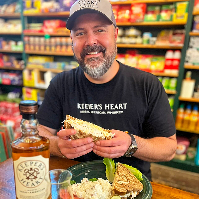 Nothing says "authentic experience" like a happy customer enjoying a sandwich with whiskey on the side. This is lunch and dinner solved in one delicious sitting.