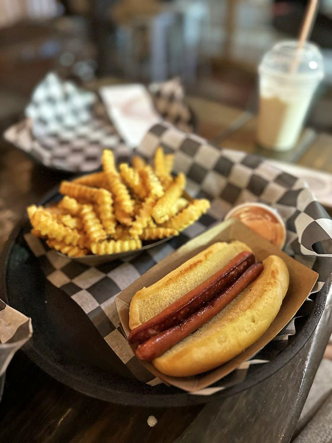 Even the hot dog gets the Al's treatment: nestled in a toasted bun with crinkle fries standing guard nearby.
