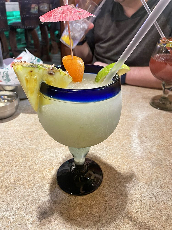 Not just a margarita&mdash;it's vacation in a glass, complete with tiny umbrella. The salt rim isn't optional, it's essential to the experience.