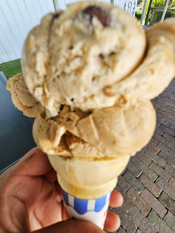Ice cream stacked higher than your childhood dreams. This cone doesn't just satisfy a sweet tooth&mdash;it throws a party for your entire mouth.