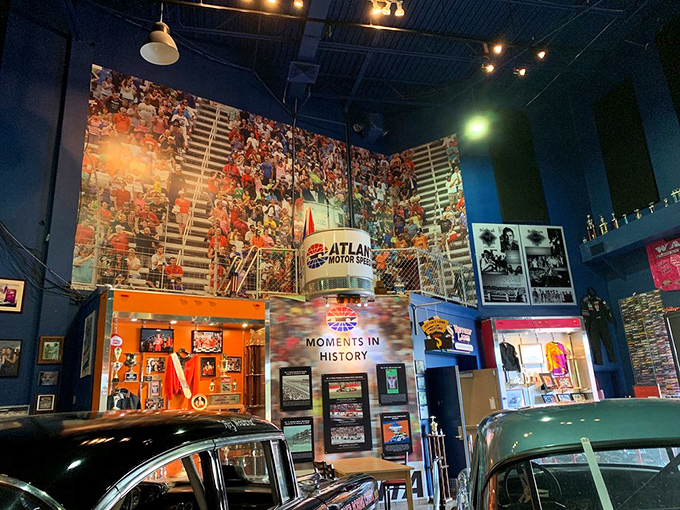 Racing memorabilia climbs the walls like mechanical ivy. This immersive display of Atlanta Motor Club history proves Southern racing culture runs deeper than NASCAR's corporate polish.