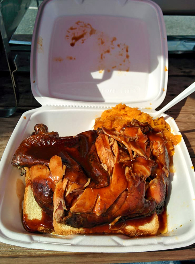 This chicken sandwich isn't just food—it's an event. The bread is merely a delivery system for smoky, saucy perfection.