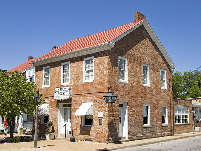 The Old Brick Building stands as testament to changing times. Where French vertical logs once dominated, American brick construction eventually took hold.
