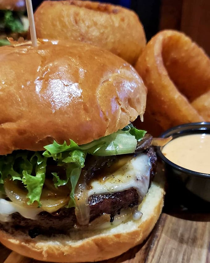 A burger so perfectly composed it deserves its own Instagram account. Those onion rings aren't a side &ndash; they're a halo.