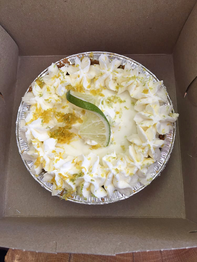 The Key Lime pie wears its crown of whipped cream and lime slices like royalty, bringing Florida sunshine to Connecticut one tangy bite at a time.