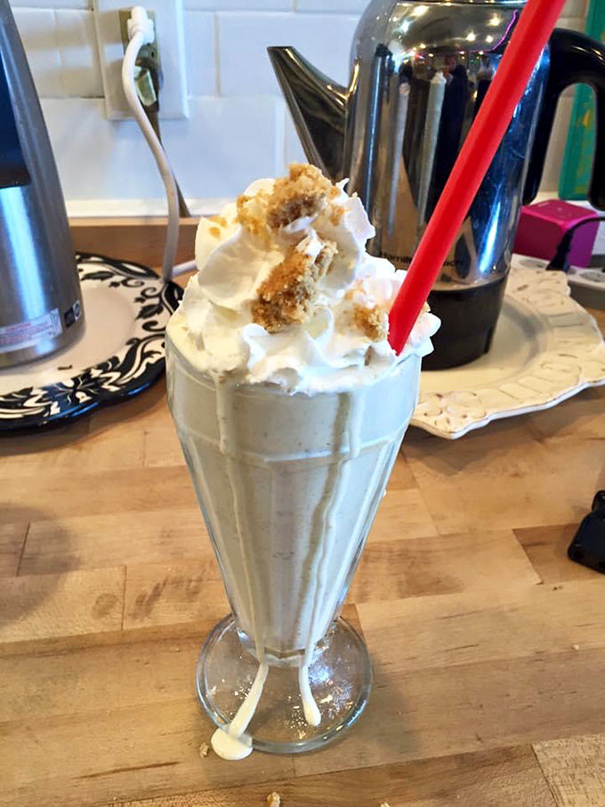 This isn't just a milkshake &ndash; it's a structural engineering marvel topped with enough whipped cream to make a cloud jealous.