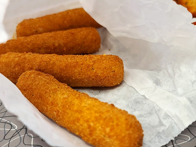 Golden mozzarella sticks with that perfect pull&mdash;the kind that make you remember why some foods became classics long before they were retro.