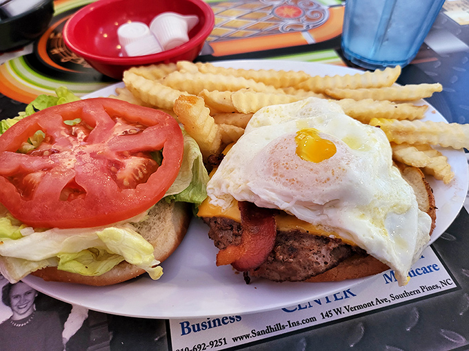 The one-eyed burger watches you with its sunny side up eye, daring you to take that first magnificent bite.