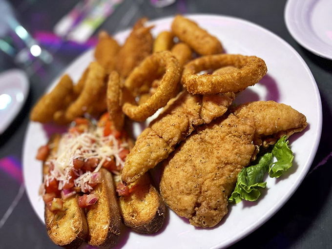 Crispy chicken tenders that could make the Colonel salute, served with enough sides to feed a small poker tournament.