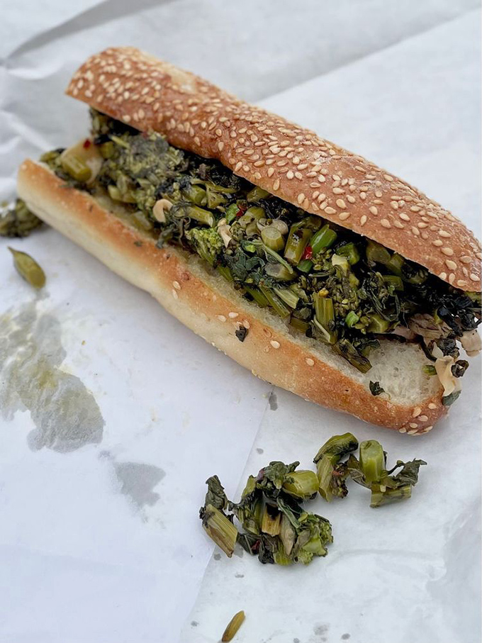 Philly Roast Pork with bitter broccoli rabe creates that perfect contrast of flavors. When a sandwich makes you momentarily forget conversation&mdash;that's love.