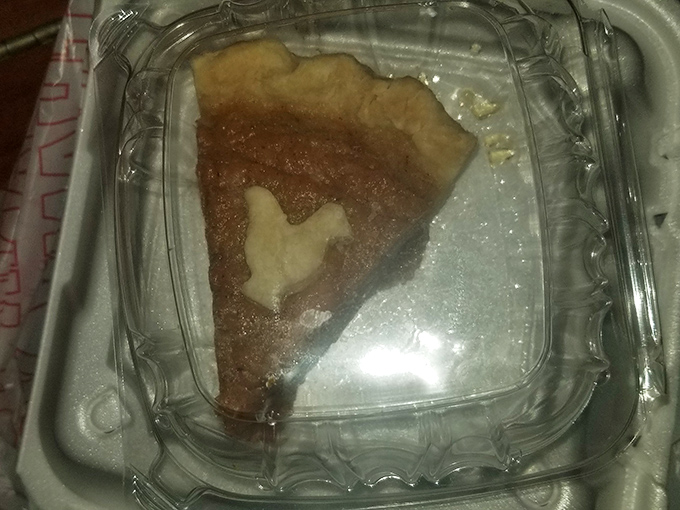 Sweet potato pie with a chicken-shaped cutout&mdash;because even dessert knows what the star attraction is at this establishment.