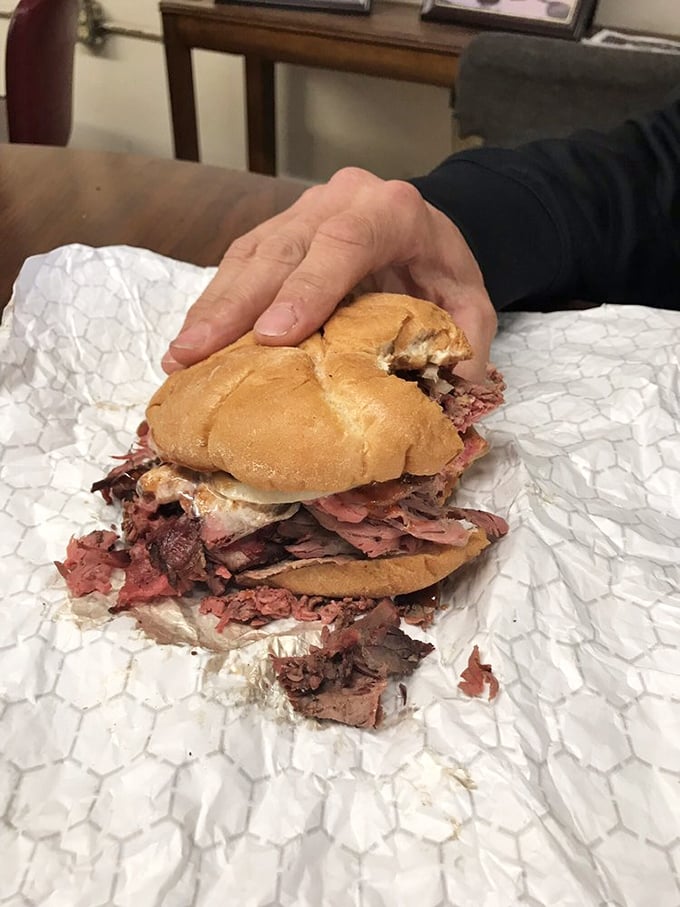 This beef sandwich isn't just a meal; it's a meditation on what happens when smoke, time, and meat unite under skilled hands.