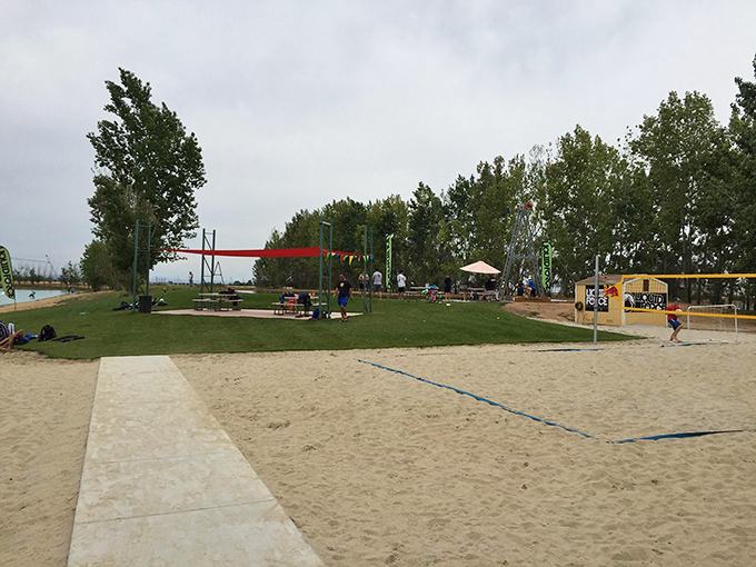 Sand volleyball courts where competitive spirits soar higher than the California sun, and "I used to play in college" claims are immediately put to the test.
