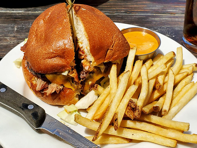 A sandwich that requires both hands and several napkins. Those golden fries are the supporting actors in a show-stealing performance.