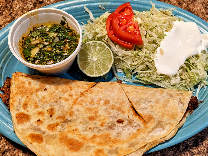 Quesadilla perfection isn't just about the cheese pull – it's about balance. This one achieves dairy nirvana without drowning the fillings.