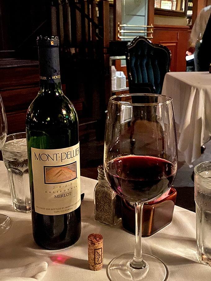 A glass of California Merlot against the backdrop of old-school elegance. Some relationships are just meant to be&mdash;like red wine and red meat.