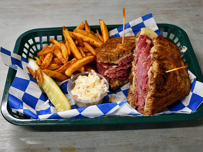 The Reuben: where corned beef, sauerkraut, Swiss and rye engage in a delicious dance party. Served with fries that could start their own fan club.