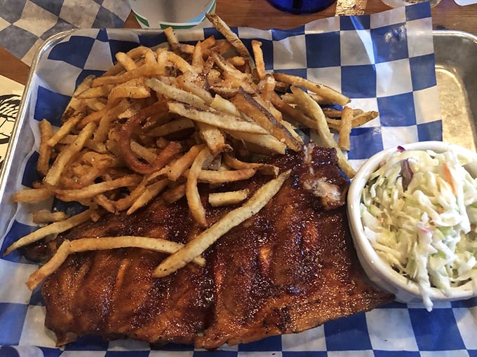Hand-cut fries and slaw flanking a rack of ribs that's been kissed by smoke and fire&mdash;a trio that makes you question why you ever ate anything else.